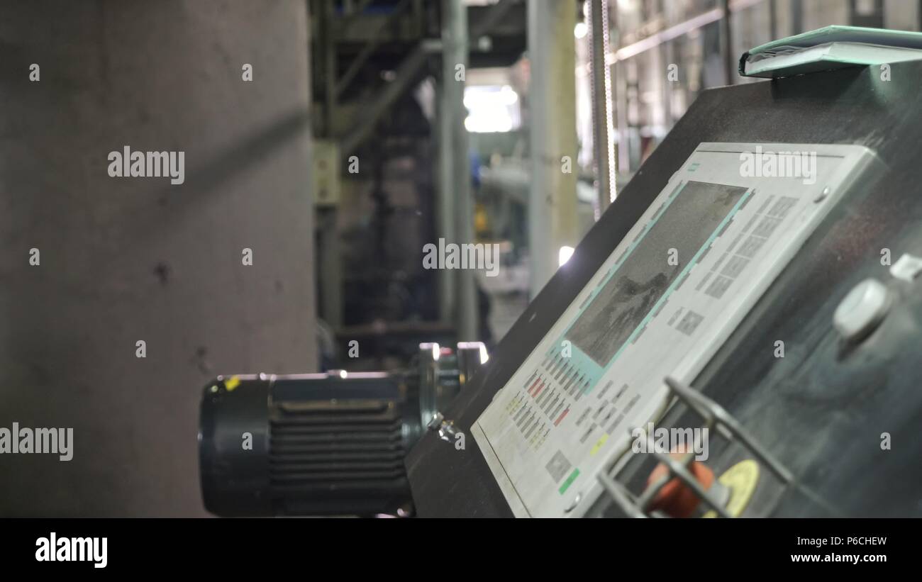 Control panel for the production line. Manufacture of plastic water ...