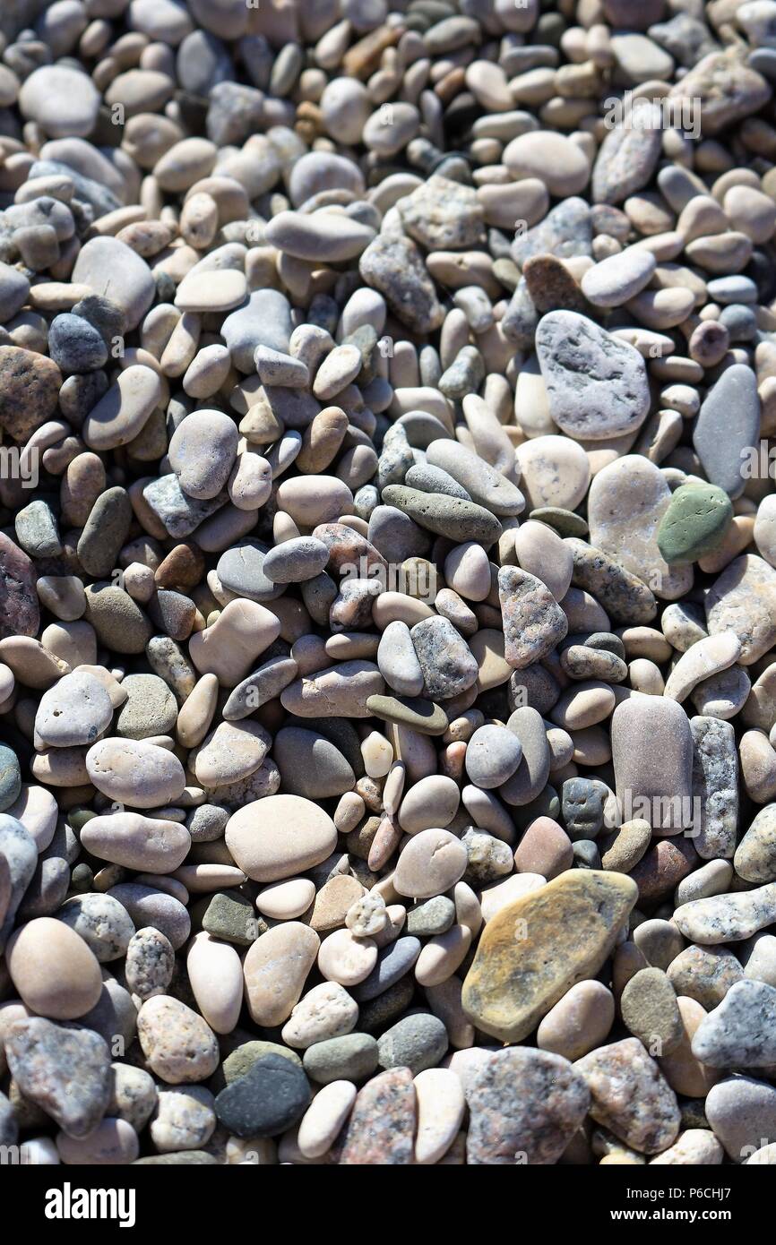 pebblesPebble stones of different colors and shapes background Stock ...