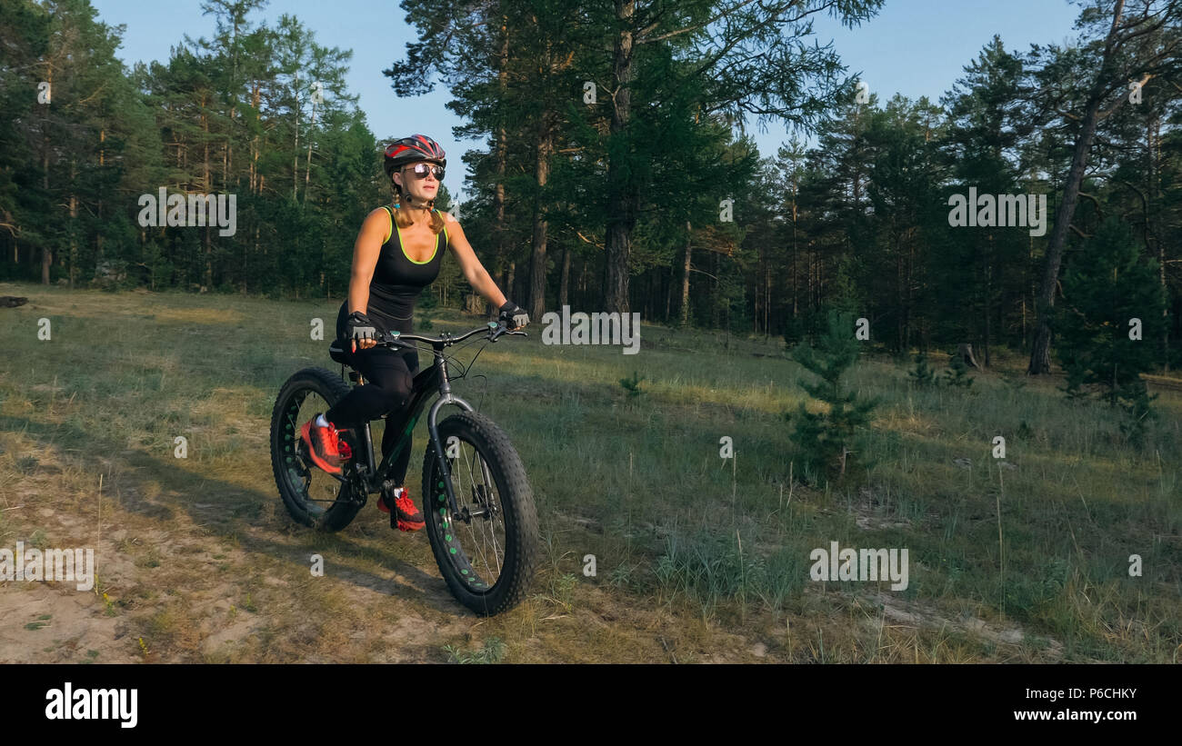Fat bike also called fatbike or fat-tire bike in summer riding in the ...