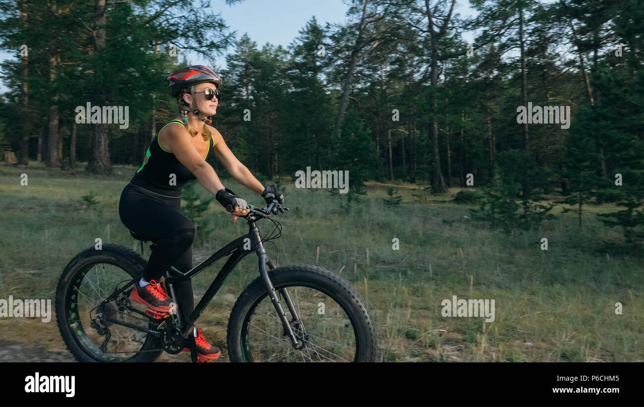 Fat bike also called fatbike or fat-tire bike in summer riding in the ...