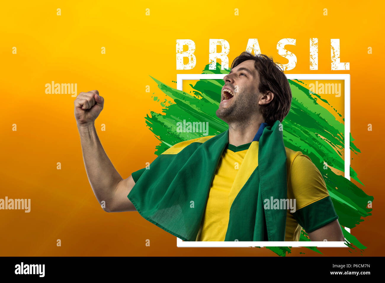 Brazilian soccer player, celebrating on a yellow background with copy ...