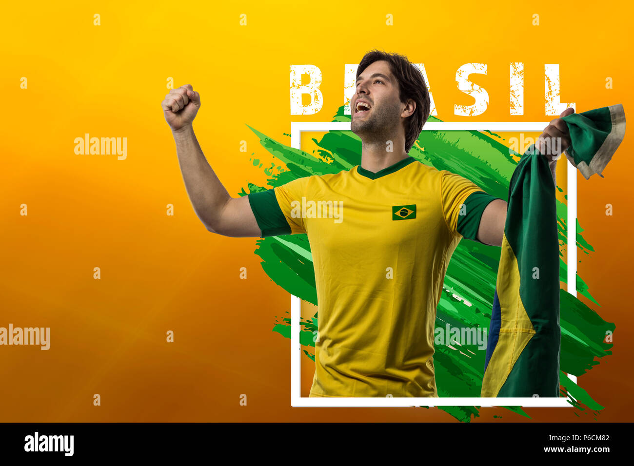 Brazilian soccer player, celebrating on a yellow background with copy ...