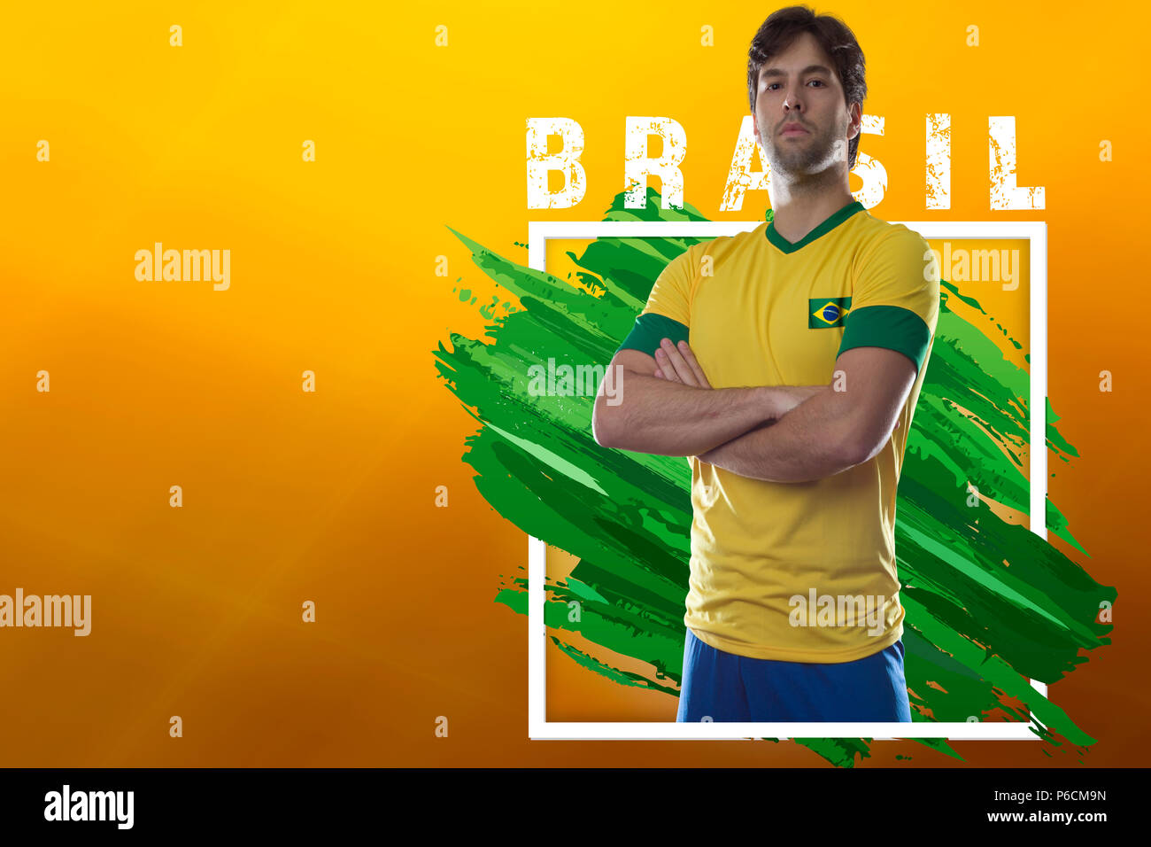 Brazilian soccer player, celebrating on a yellow background with copy ...