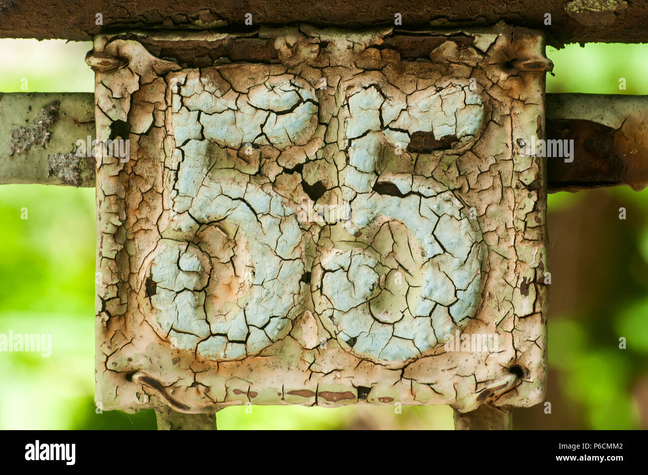 Old retro weathered cast iron plate with number 55 closeup Stock Photo ...