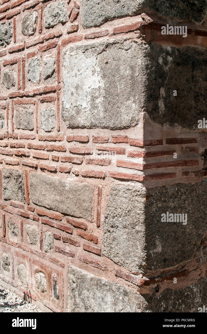 Corner of ancient Roman stone building wall closeup Stock Photo - Alamy