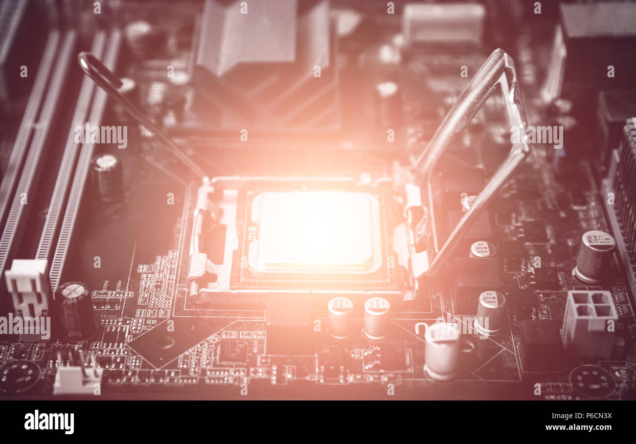 cpu power installed in socket and power light process Stock Photo - Alamy
