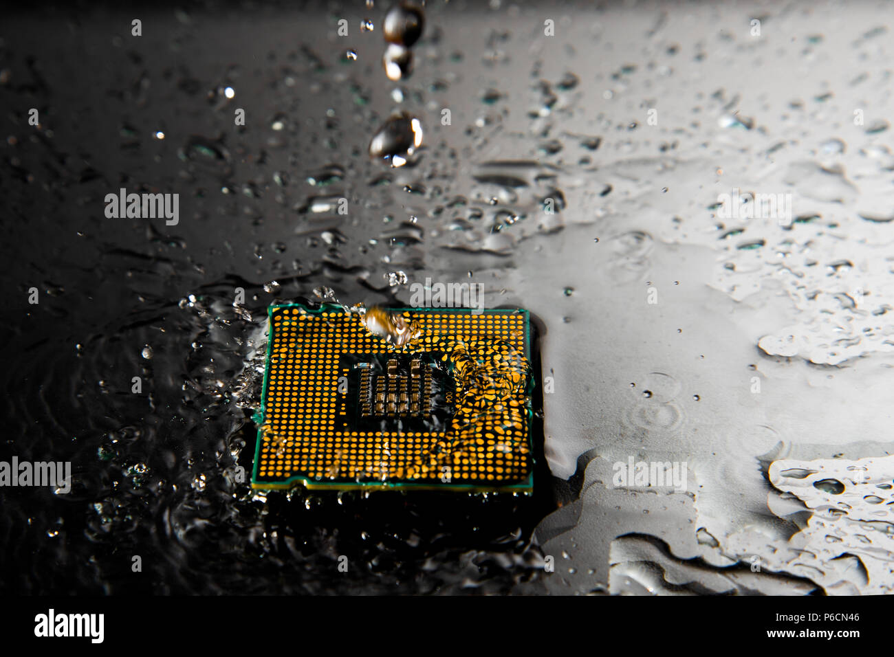 water drop on CPU on blackboard Stock Photo - Alamy