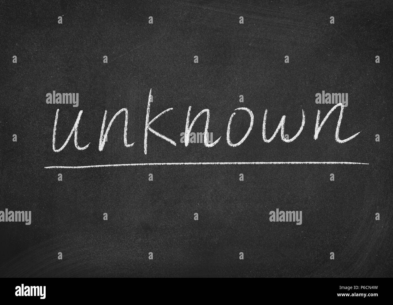 unknown concept word on a blackboard background Stock Photo - Alamy