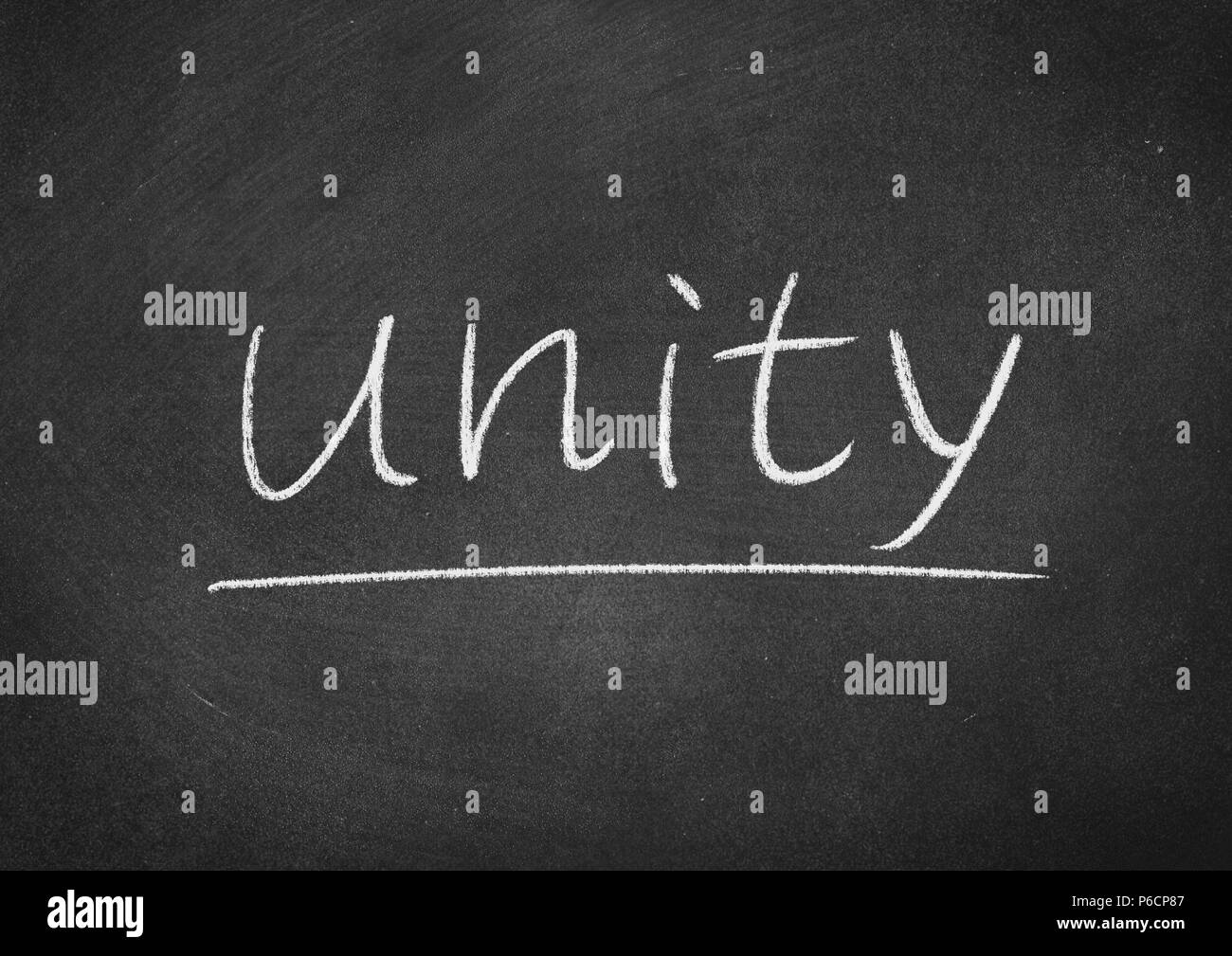 unity concept word on a blackboard background Stock Photo - Alamy