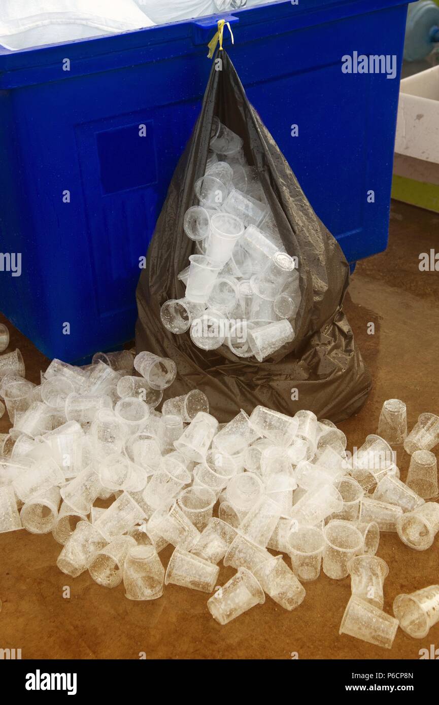 Recyclable garbage of plastic glass in rubbish bin and floor Stock ...
