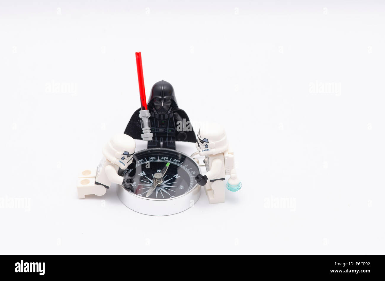 mini figure of storm troopers and darth vader with a compass. Lego ...