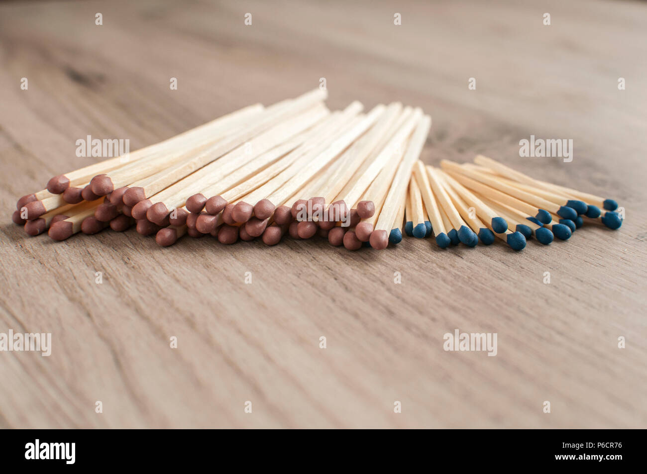 A pile of wooden safety long match sticks on wooden background Stock ...