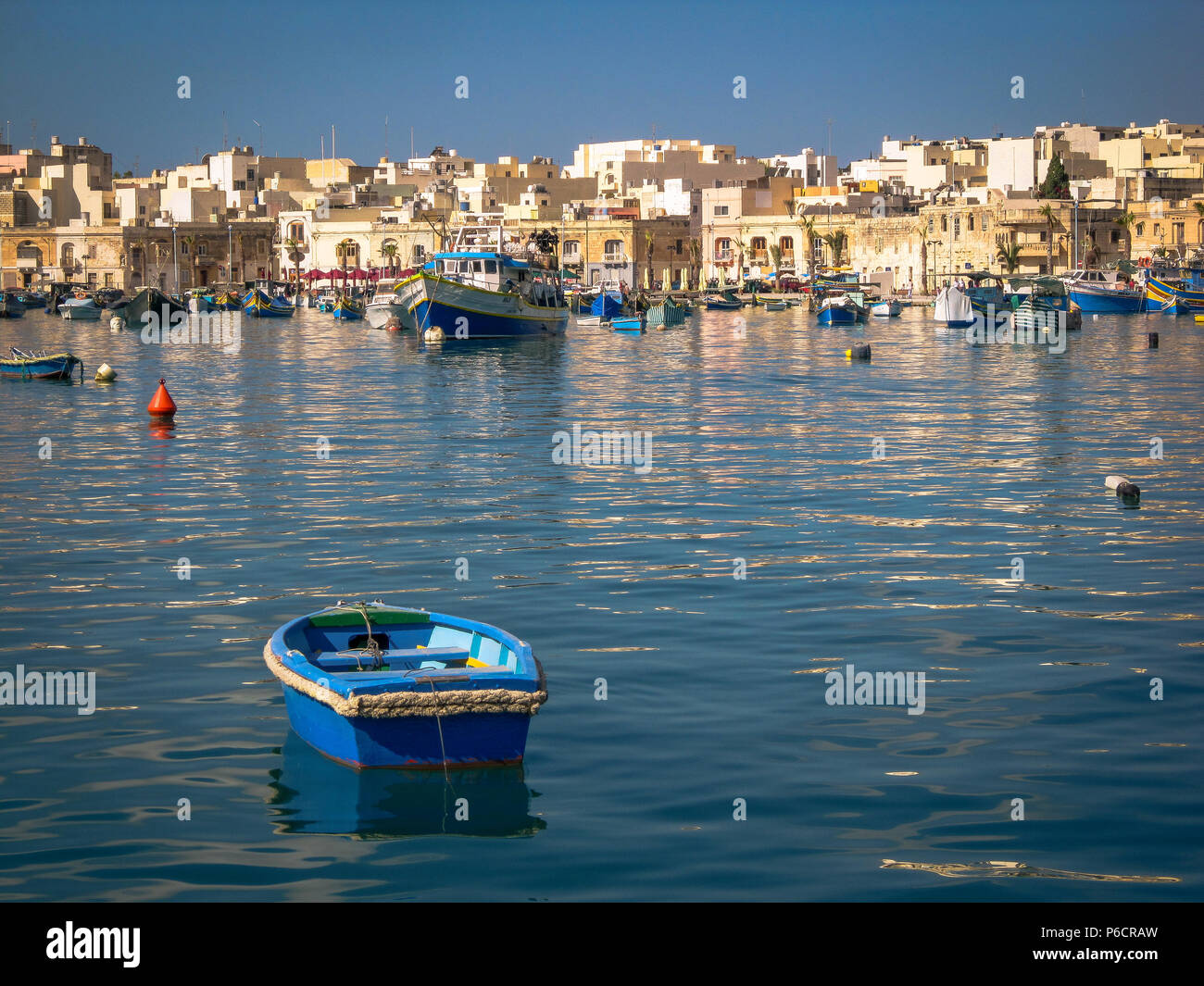 Colorful boats docked and anchored in Mediterranean Harbor Stock Photo ...