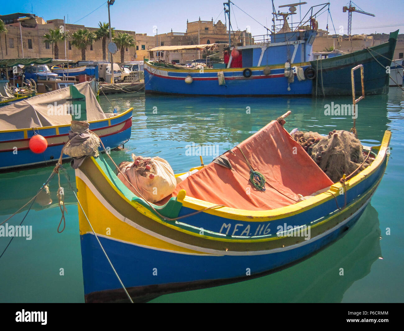 Colorful boats docked and anchored in Mediterranean Harbor Stock Photo ...