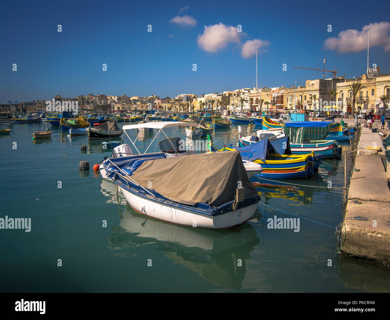 Colorful boats docked and anchored in Mediterranean Harbor Stock Photo ...
