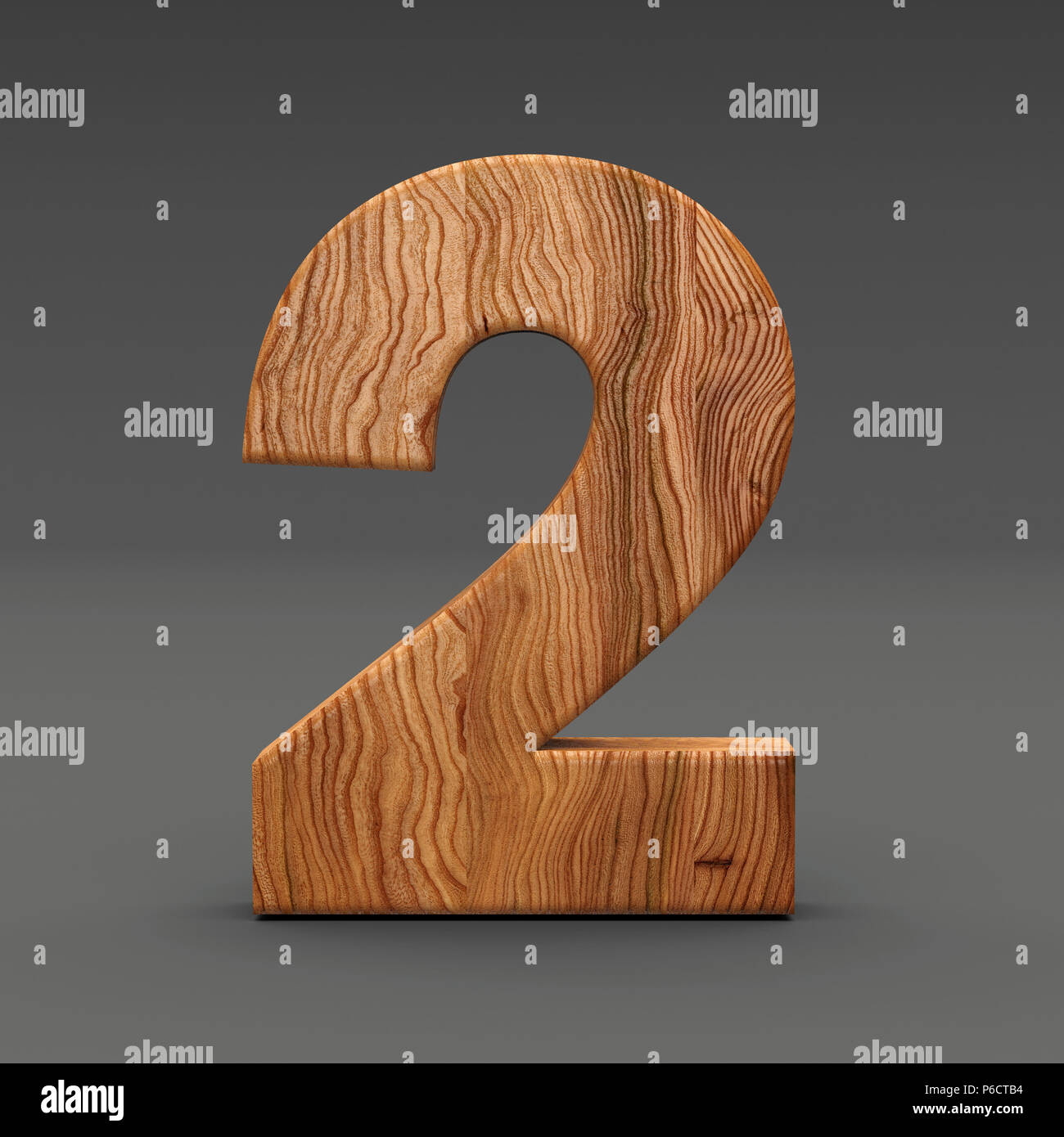 Wooden number 2 isolated on dark background Stock Photo - Alamy