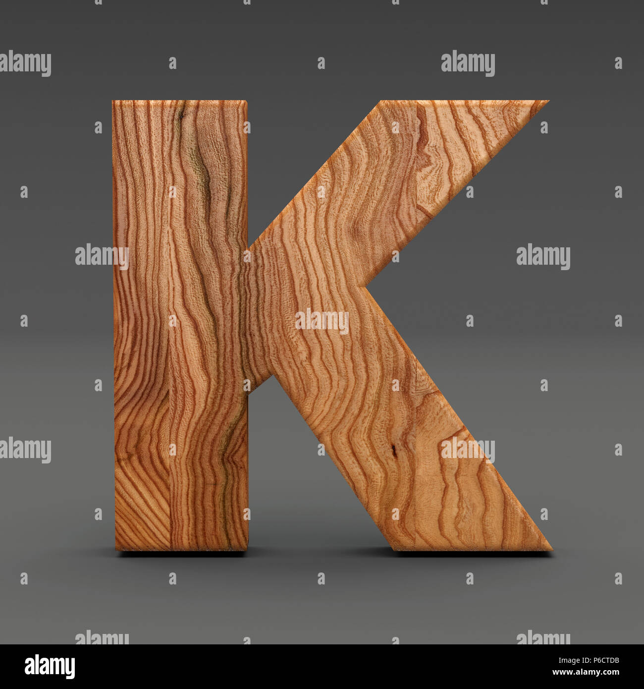 Wooden letter K isolated on dark background Stock Photo - Alamy