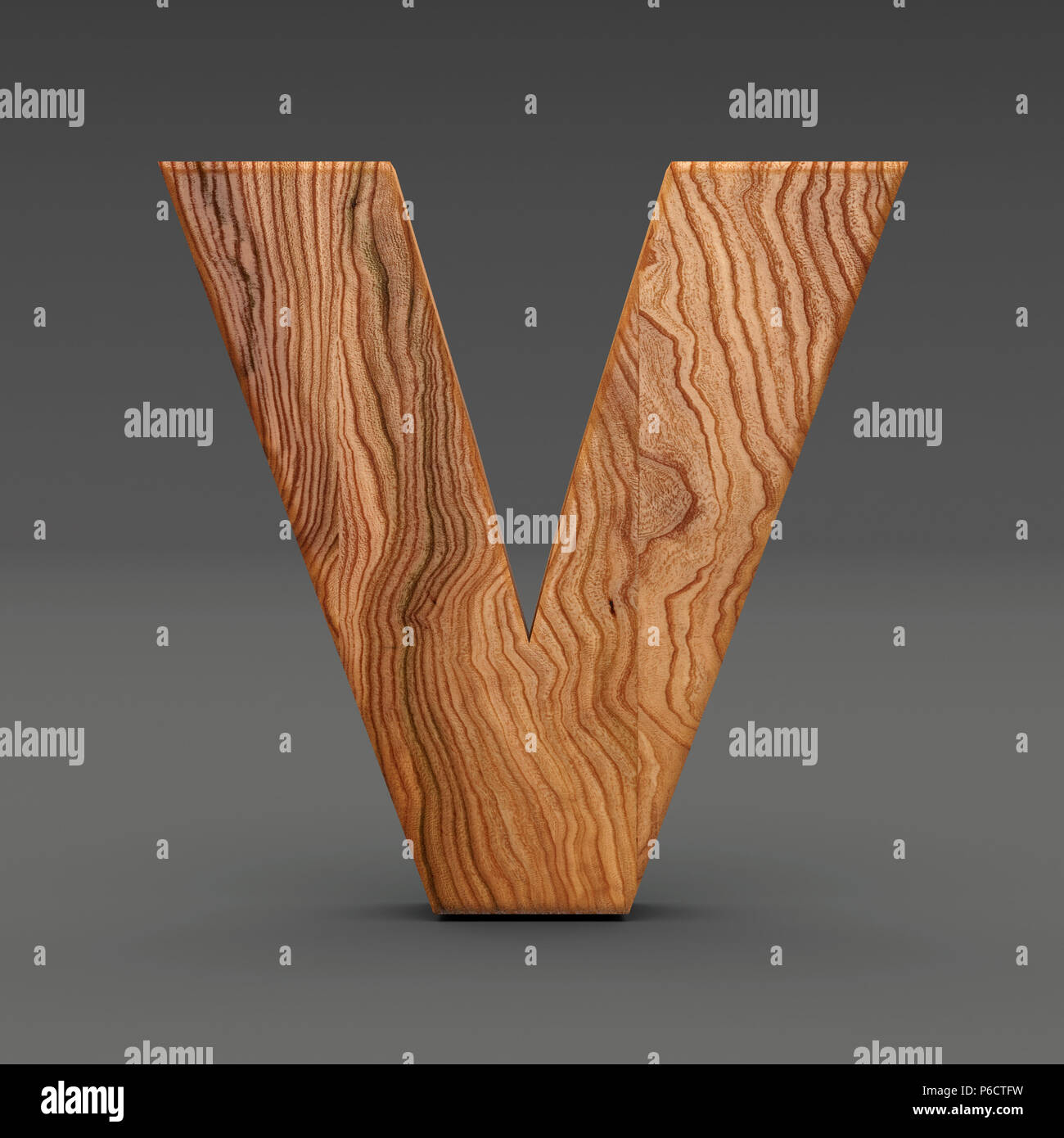 Wooden letter V isolated on dark background Stock Photo - Alamy