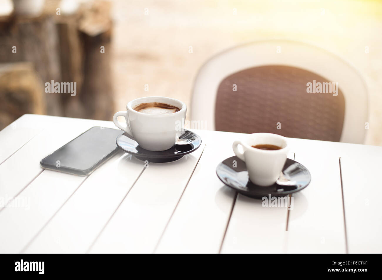 Breakfast for two in a cafe on the beach with two cups of coffee Stock ...