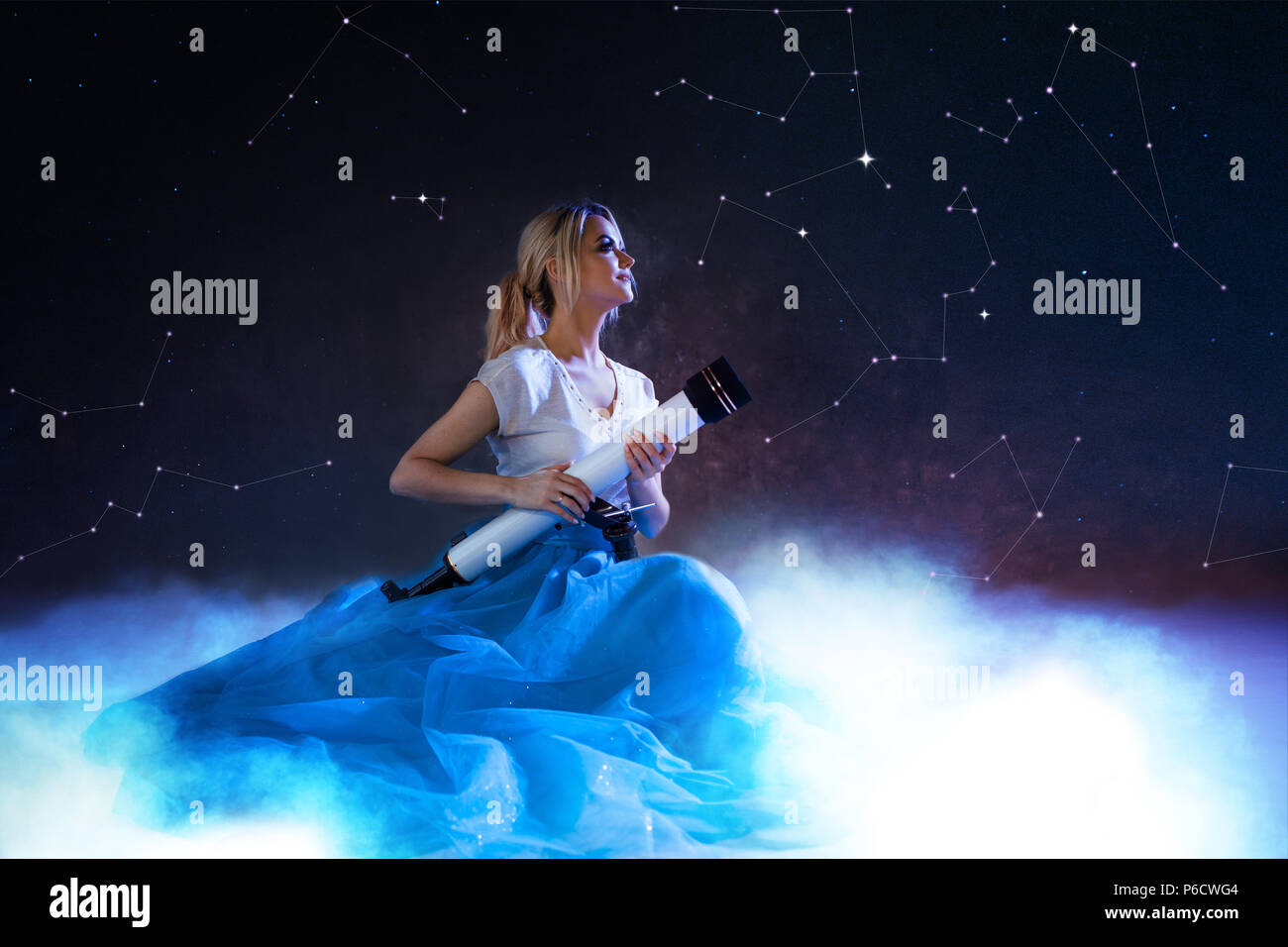 Young woman dreams of the future, concept. Girl in the sky with clouds ...