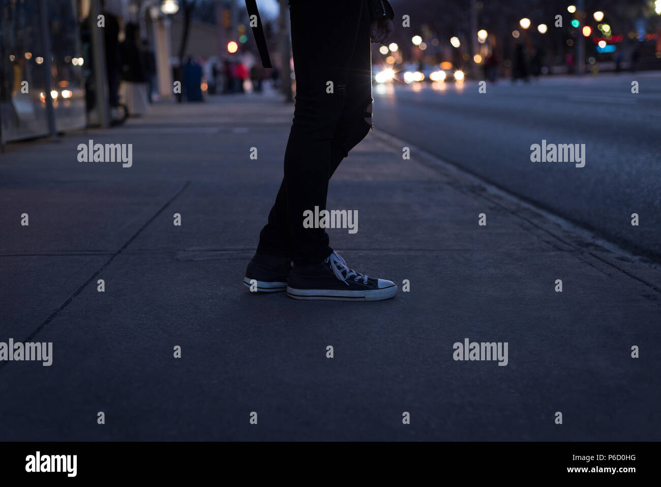 Woman dusk street hi-res stock photography and images - Alamy