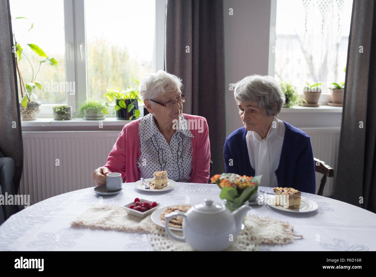 Female friends interacting having hi-res stock photography and images ...