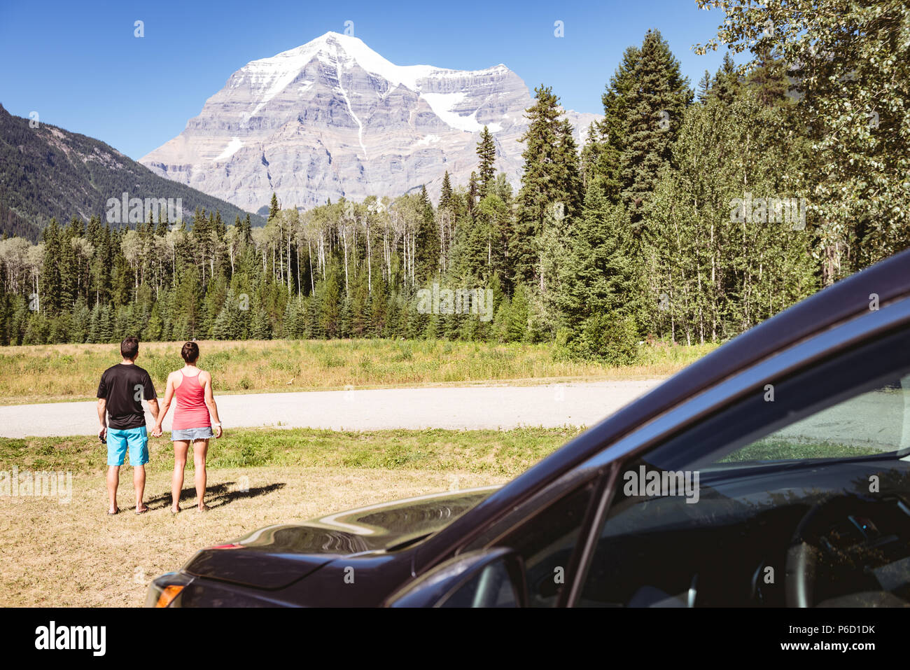 Couple looking at mountains hi-res stock photography and images - Alamy