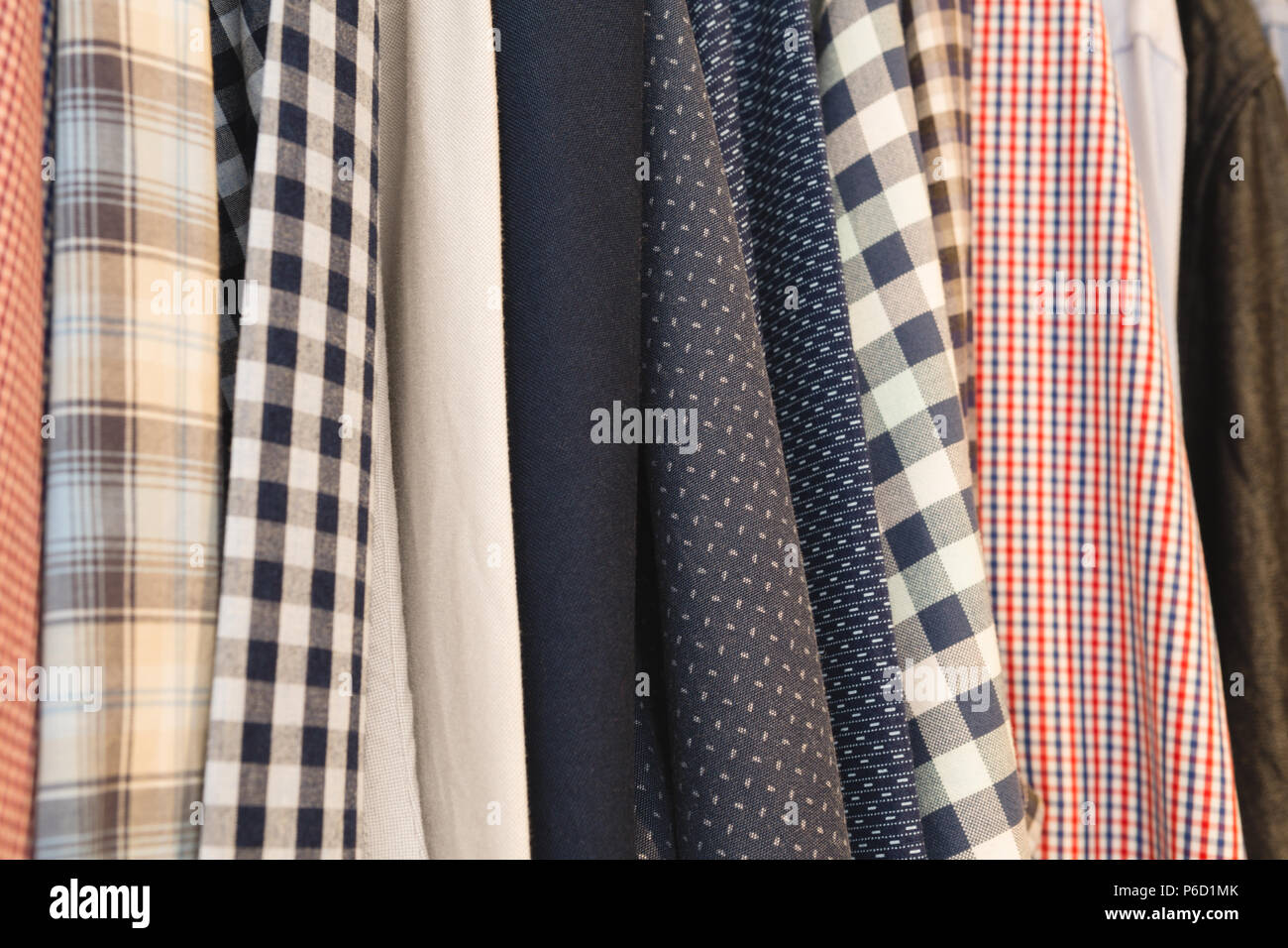 Hanging shirts hi-res stock photography and images - Alamy