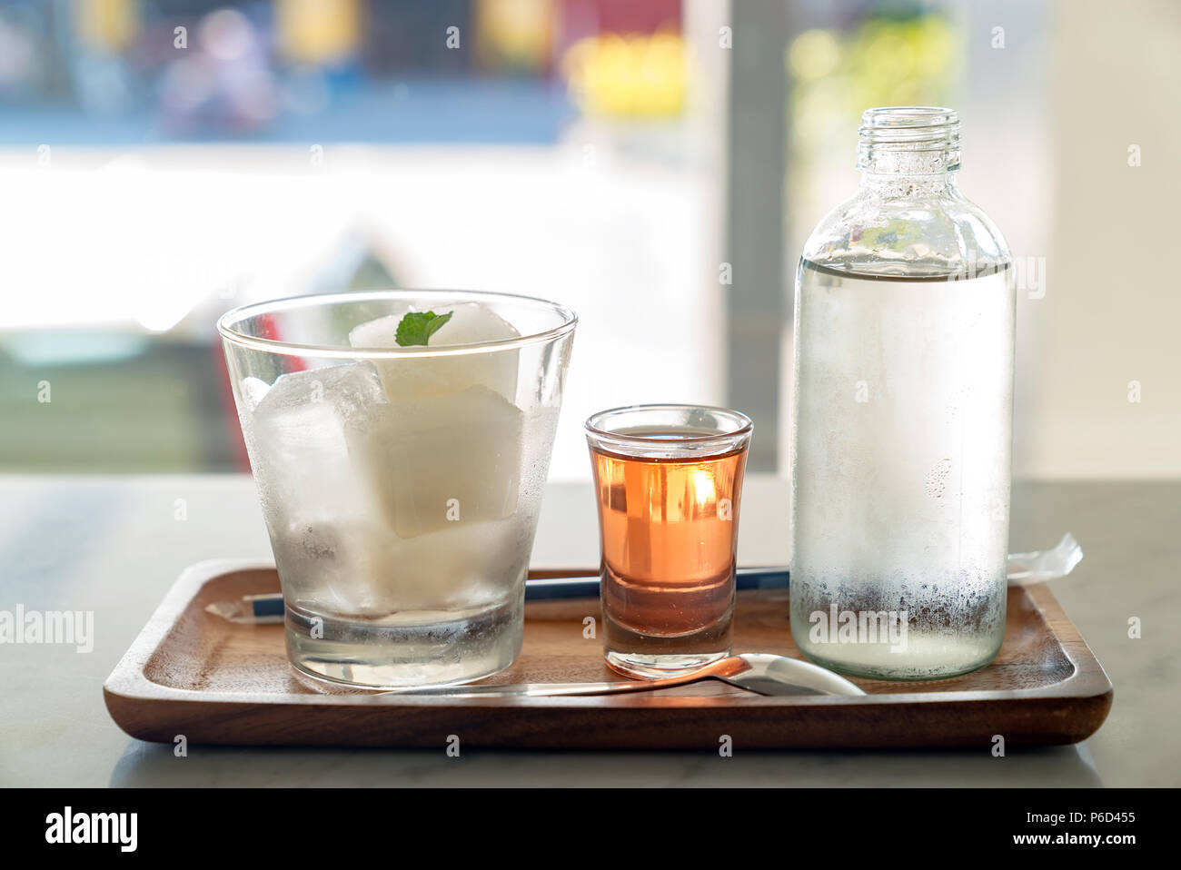 Lime ice Cube juice serve with soda water mojito Stock Photo - Alamy