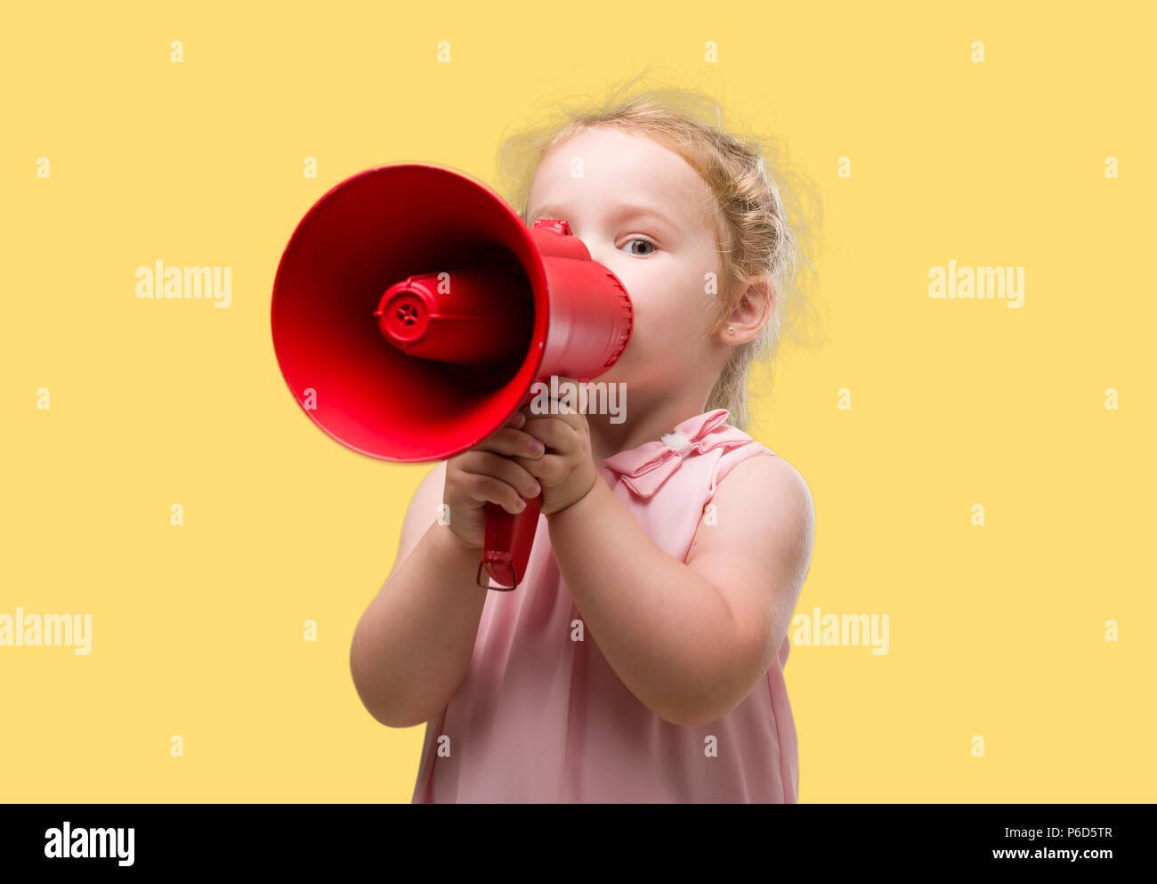 Baby with megaphone hi-res stock photography and images - Alamy