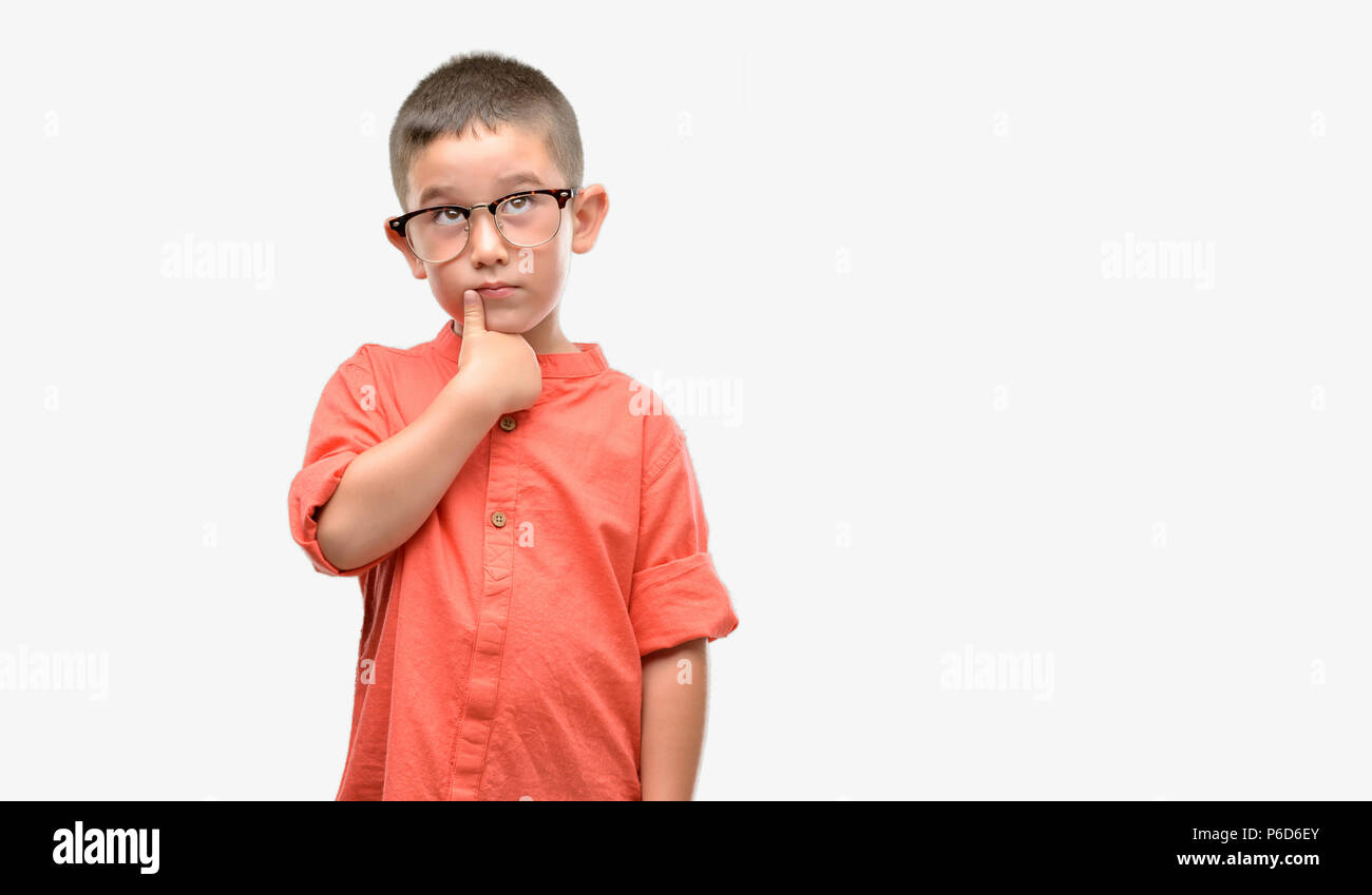 Confused boy wearing glasses hi-res stock photography and images - Alamy