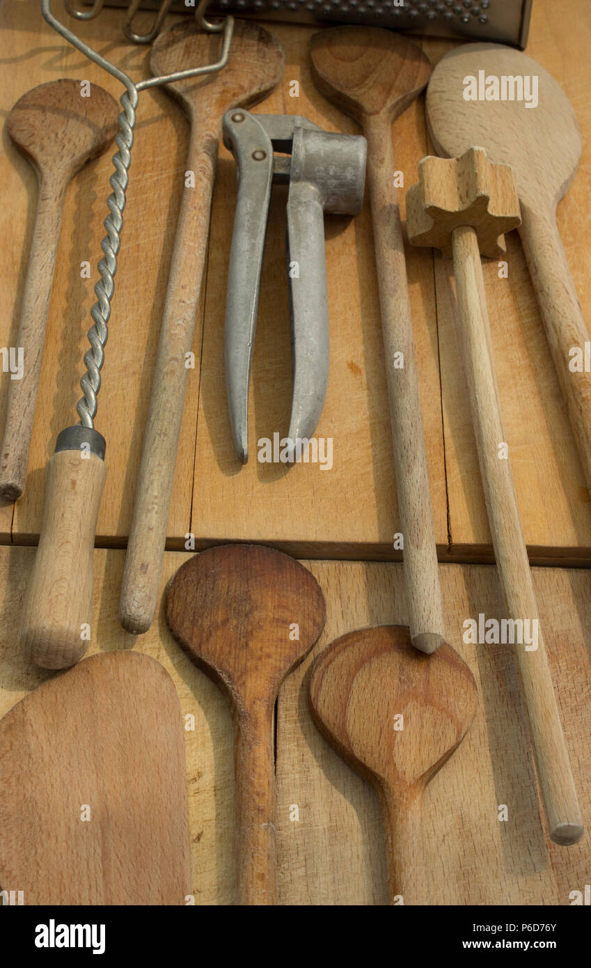 Rural kitchen utensils on vintage planked wood table Stock Photo - Alamy