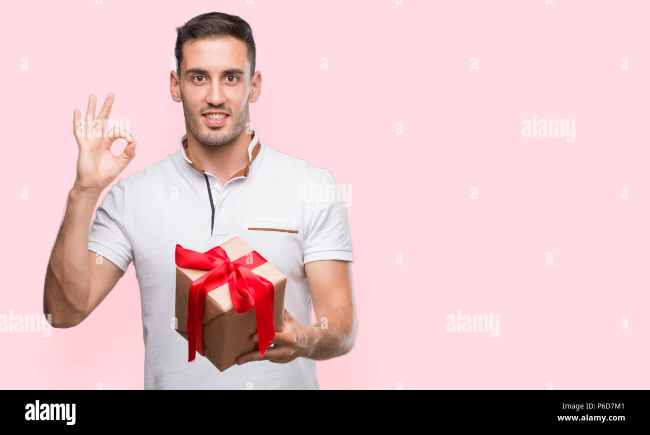 Happy man giving okay sign hi-res stock photography and images - Alamy