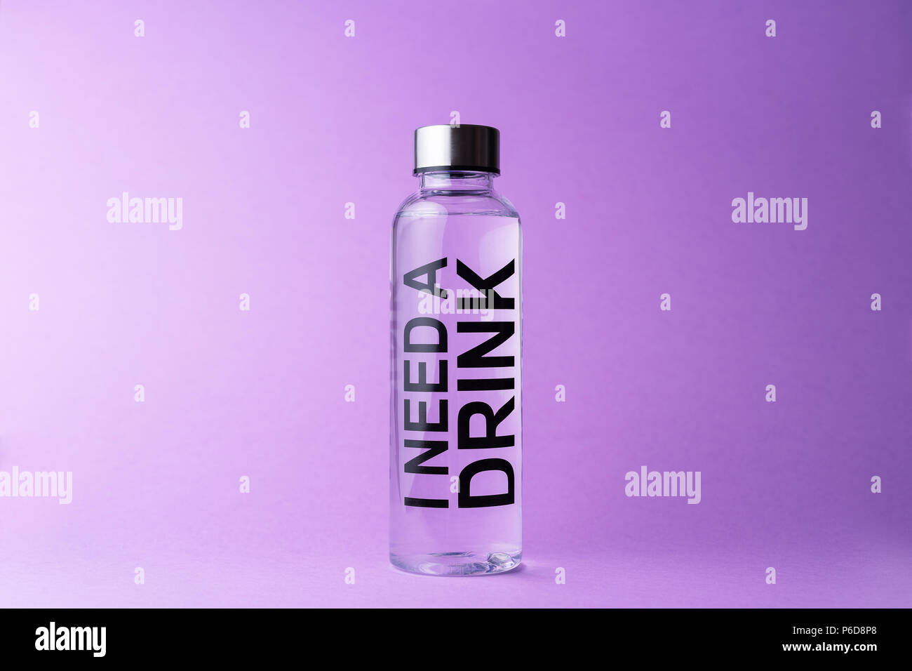 "I need a drink" water bottle over purple background Stock Photo - Alamy