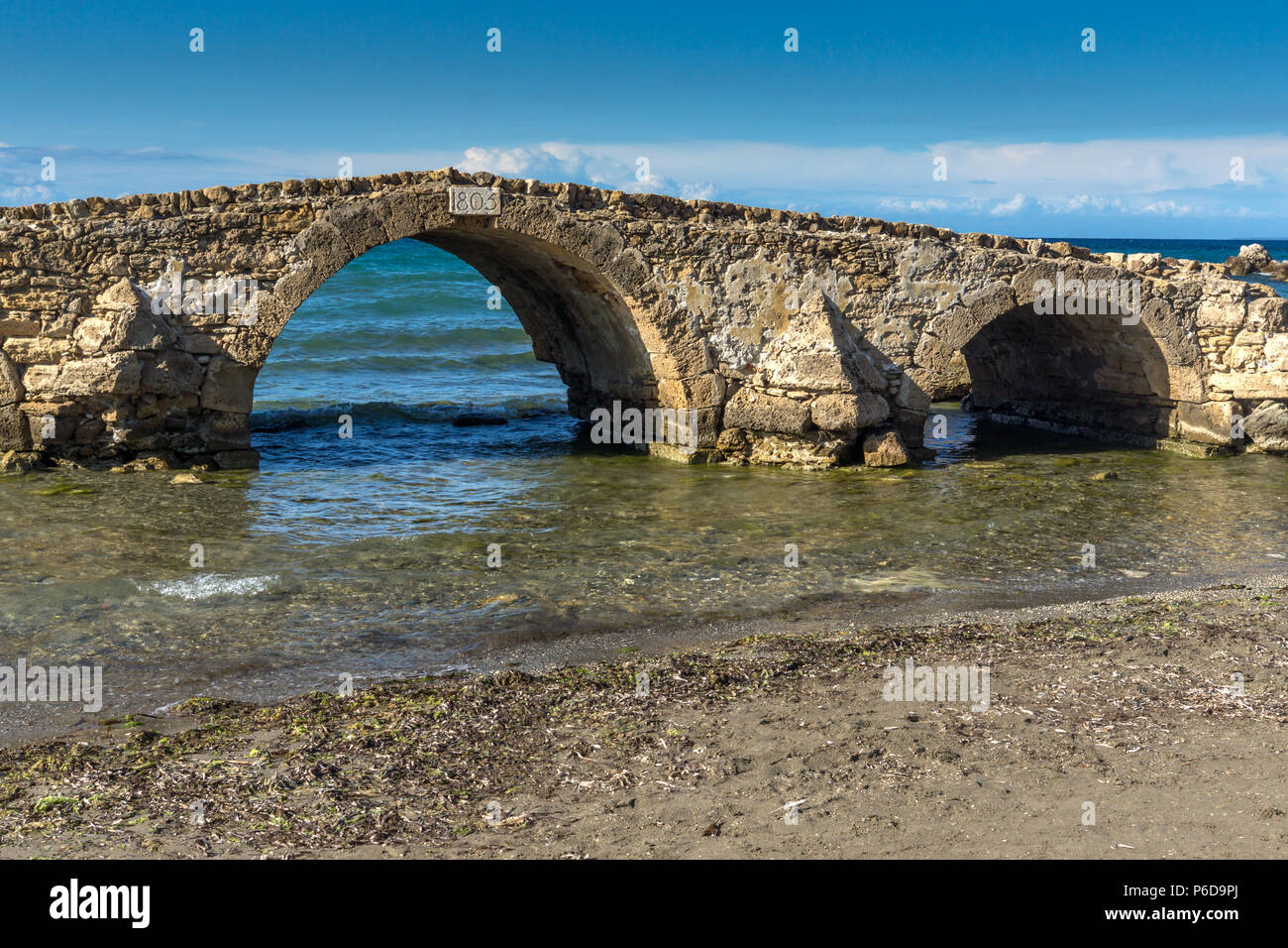 Seascape with medieval bridge in the water at Argassi beach, Zakynthos ...