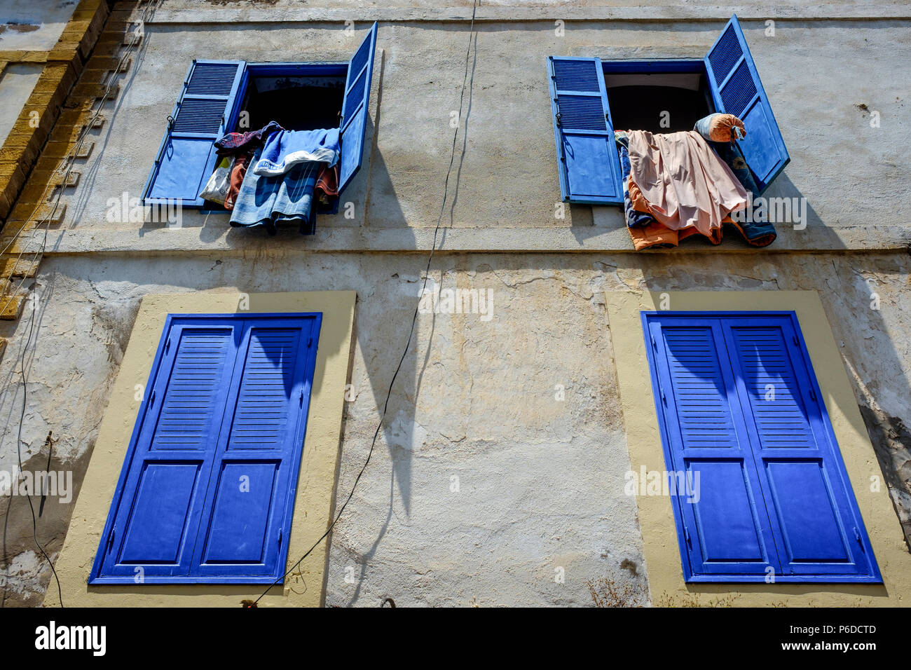 Washing hanging out of windows hi-res stock photography and images - Alamy