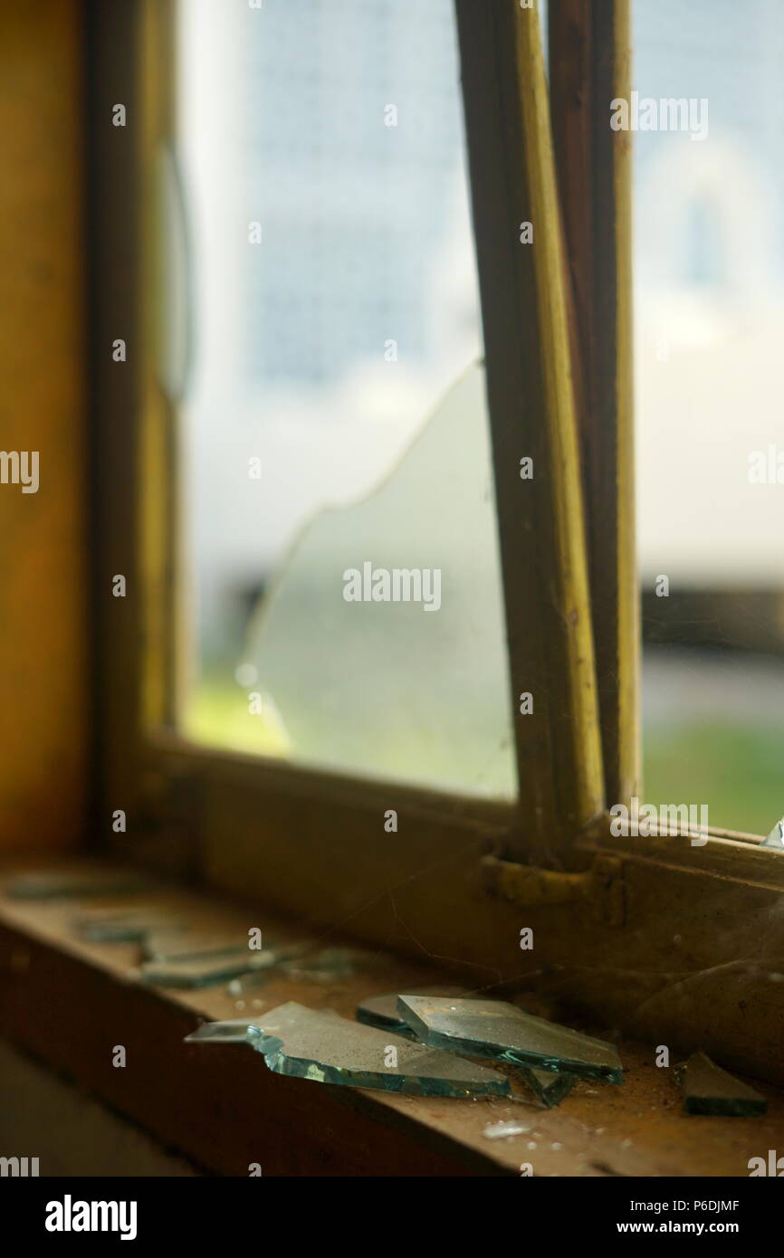 Crime Scene, Old window with broken glass Stock Photo - Alamy