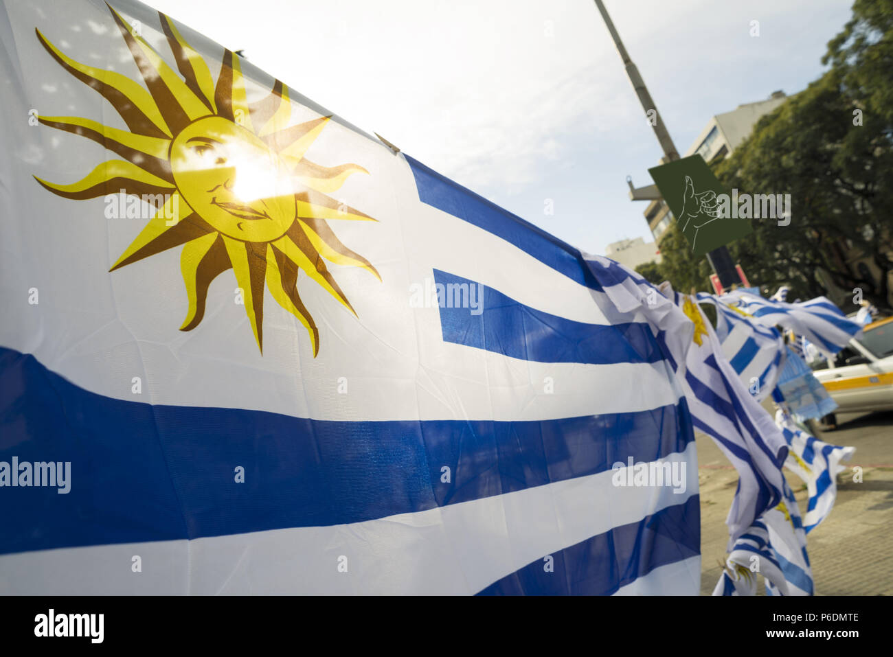 Uruguayan flag in Montevideo city street market background. Uruguay ...