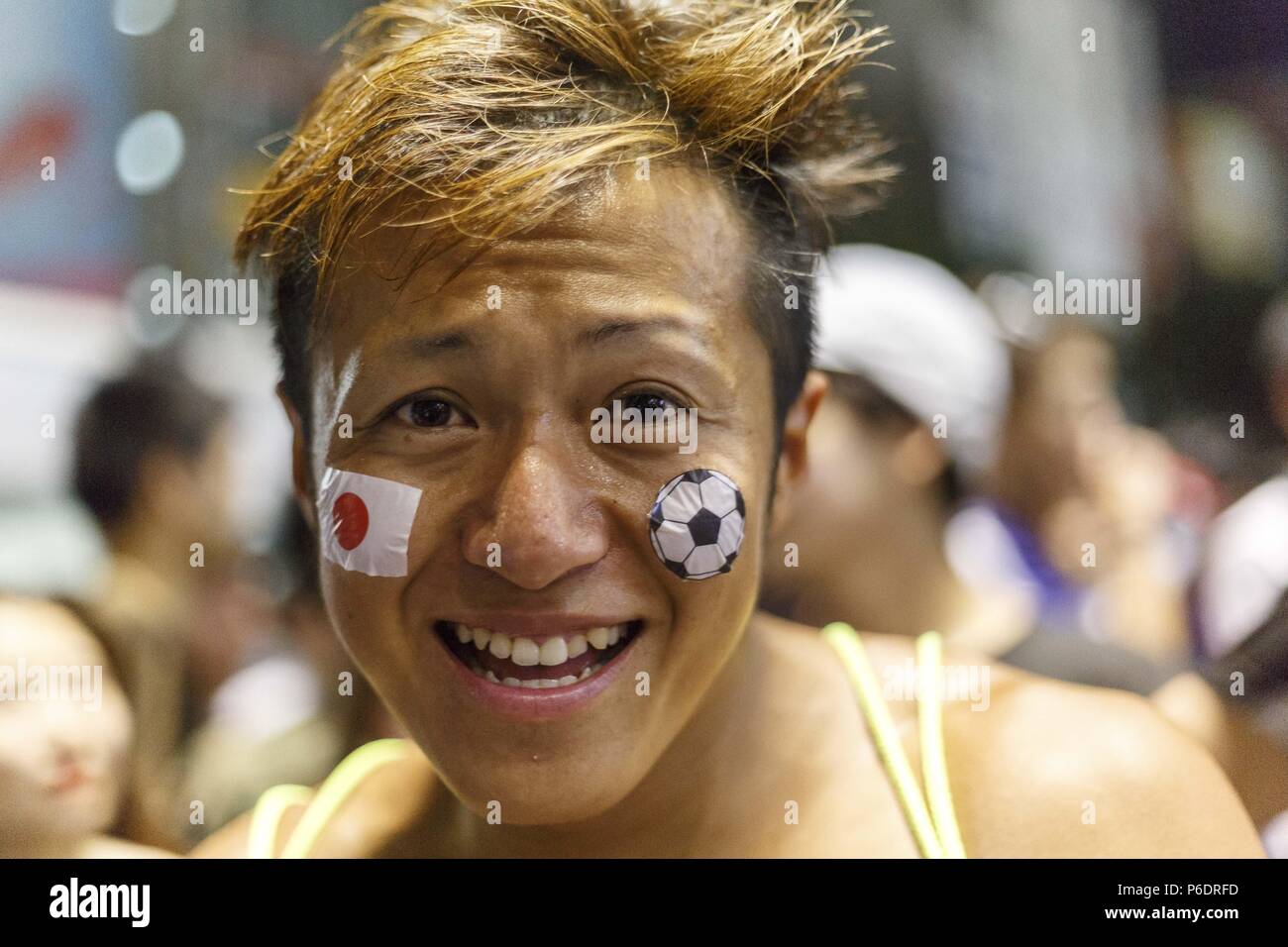 June 29, 2018 - Tokyo, Japan - A soccer fan celebrates in Shibuya after ...