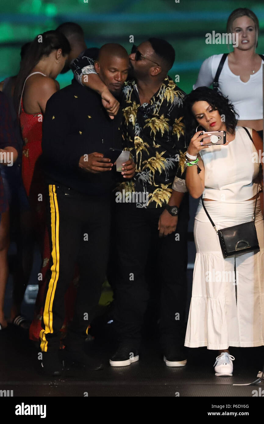 MIAMI GARDENS, FL - JUNE 30: Jamie Foxx, Dj Irie at the Topgolf during ...