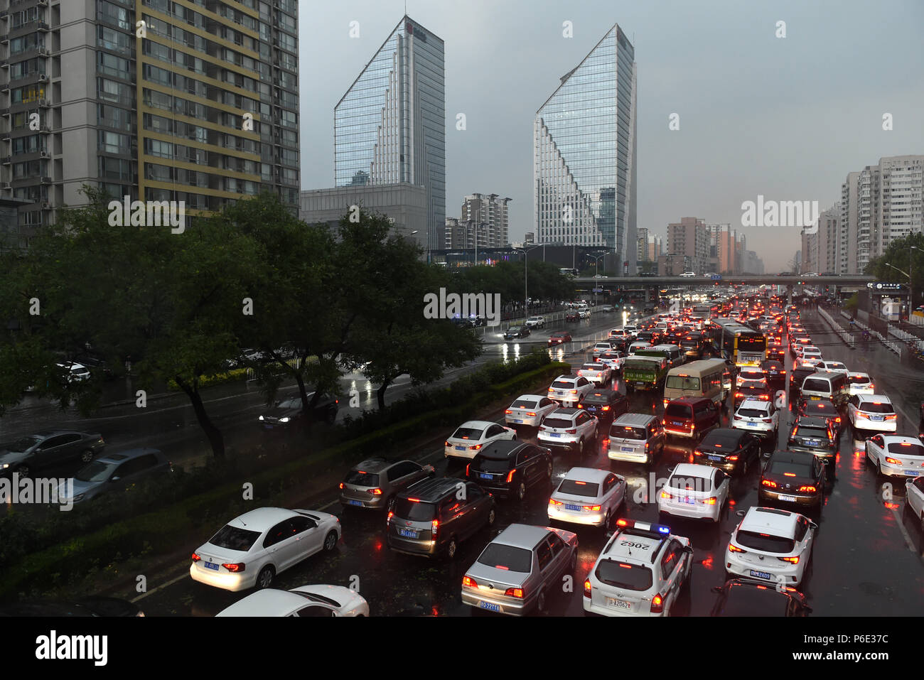 Beijing, China. 30th June, 2018. A traffic congestion occurs after a ...