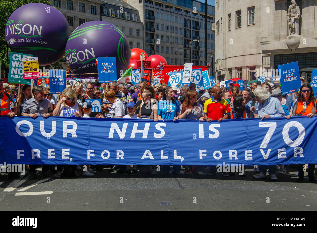 London, UK, 30 June 2018. Demonstrators at the NHS's 70th Birthday at ...