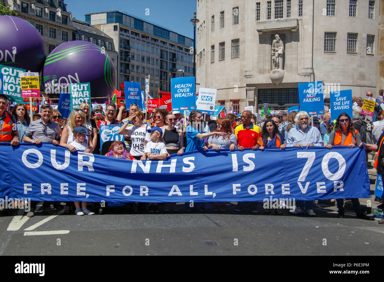London, UK, 30 June 2018. Demonstrators at the NHS's 70th Birthday at ...