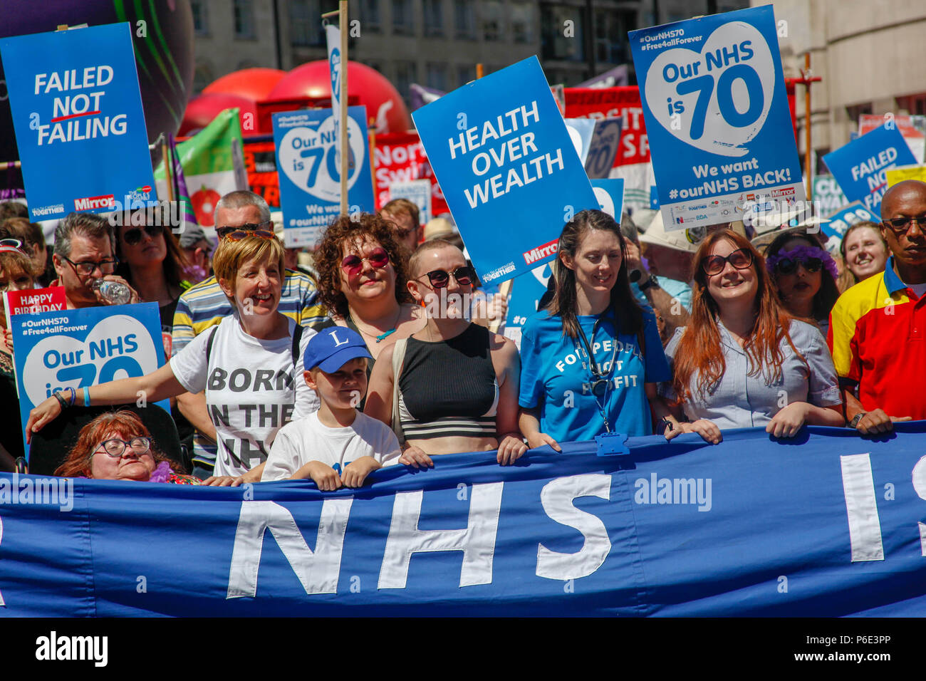 London, UK, 30 June 2018. Demonstrators at the NHS's 70th Birthday at ...