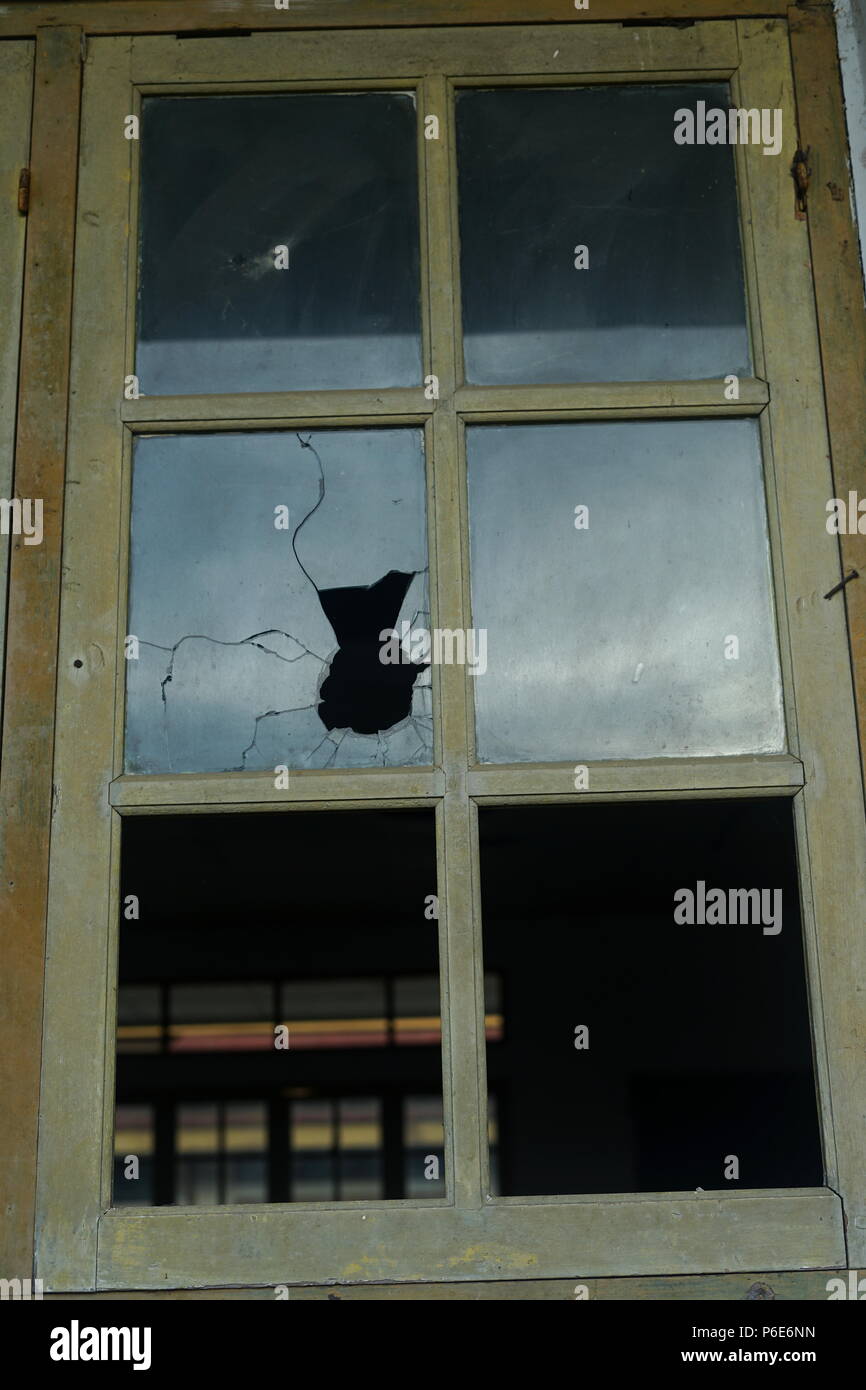 Crime Scene, Old window with broken glass Stock Photo - Alamy