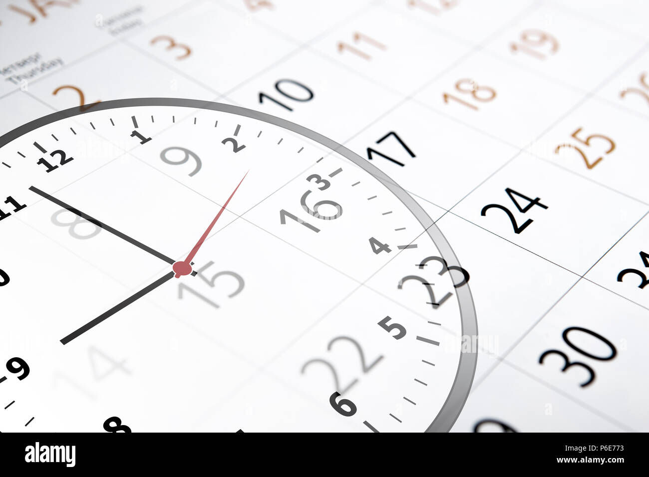 sheet of a calendar with the number of days and clock close-up Stock ...