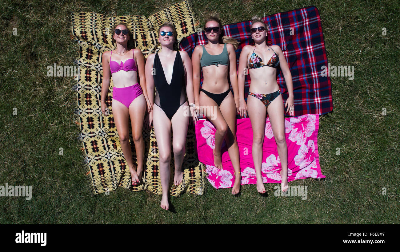 Drone picture shows Cambridge students sunbathing on the banks the River Cam in Grantchester ...