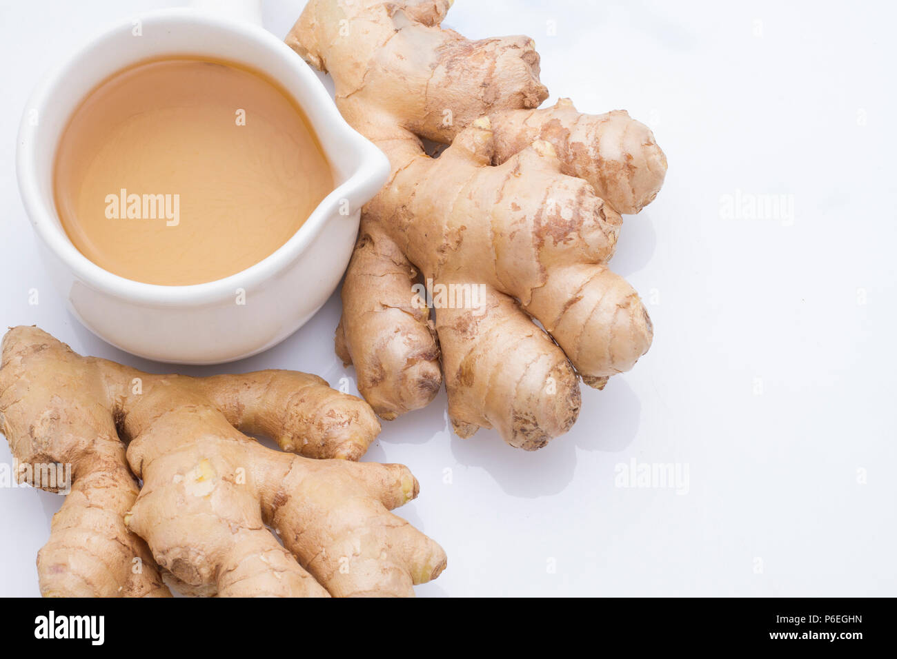 refreshing ginger tea on white background Stock Photo - Alamy