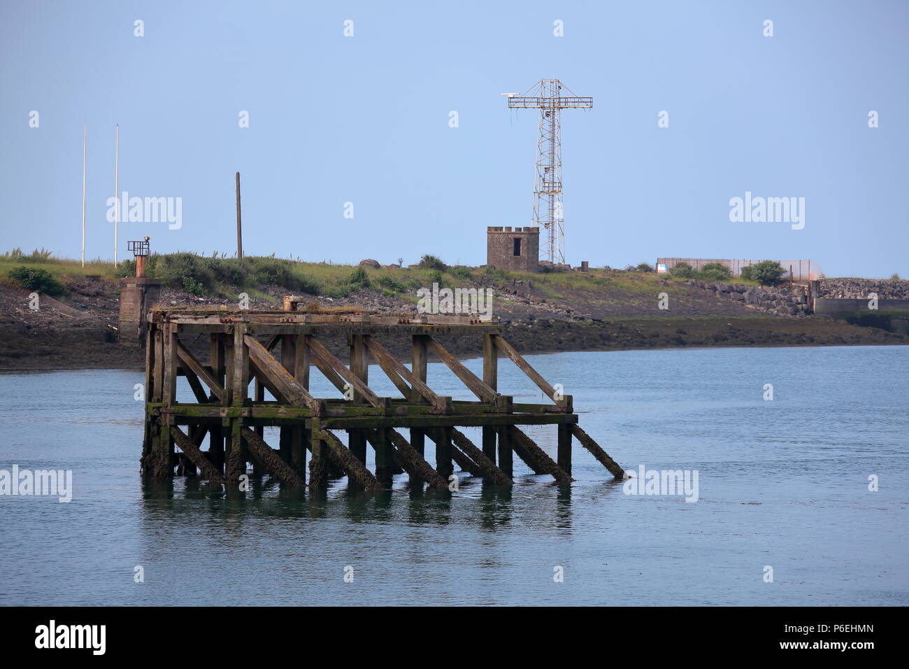 A very large heavy duty trestle out in the middle of amshipping channel ...