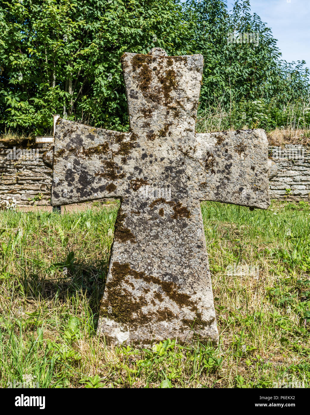 Ancient christian cross made of stone on sunny day Stock Photo - Alamy